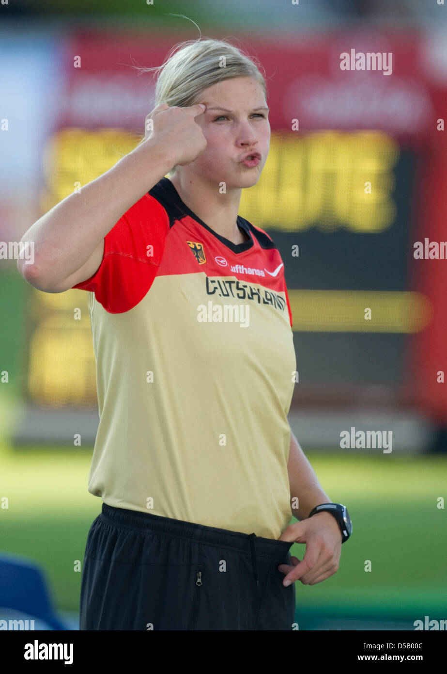 The picture features German Nadine Mueller during the women's discus ...