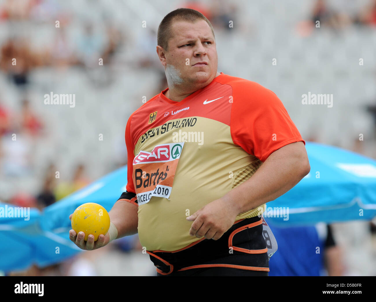 German shot putter Ralf Bartels throws at the Olympic stadium Lluis ...