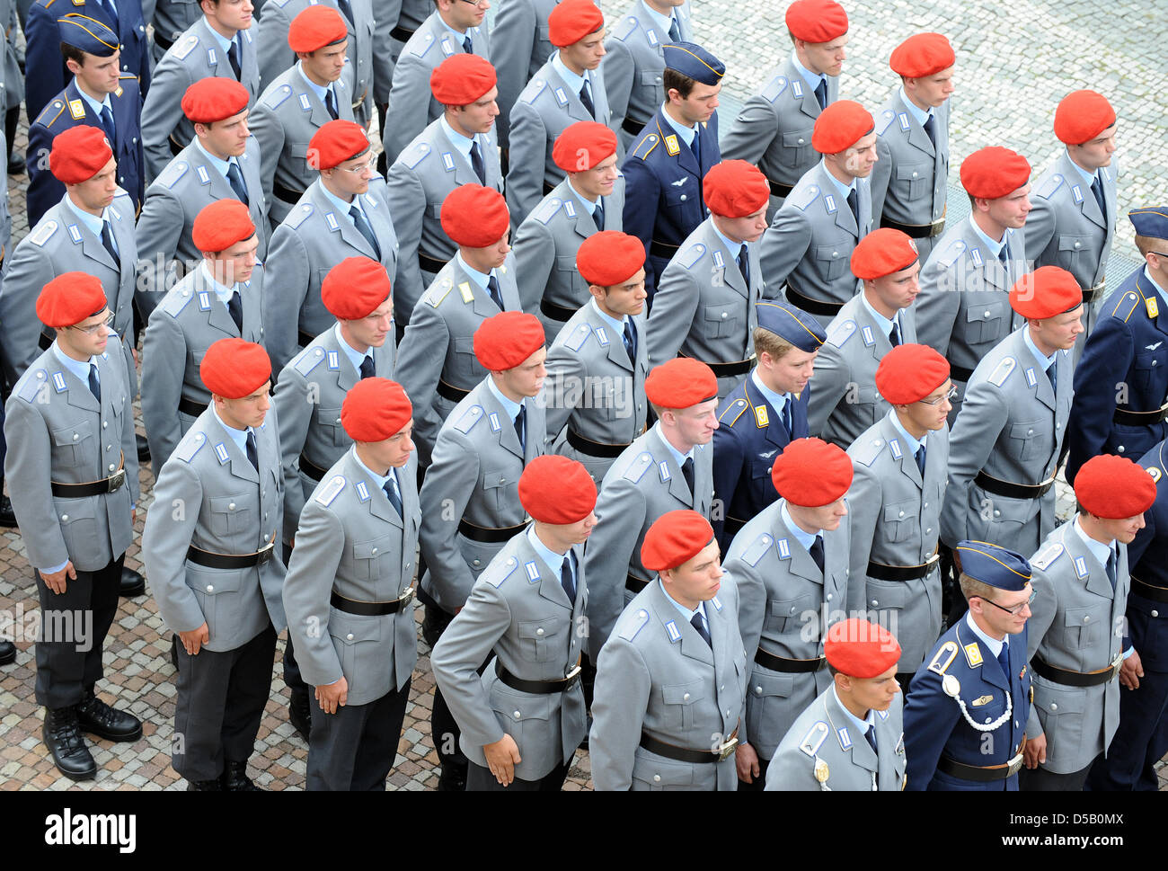 Some 650 German Bundeswehr recruits stand attention during their public ...