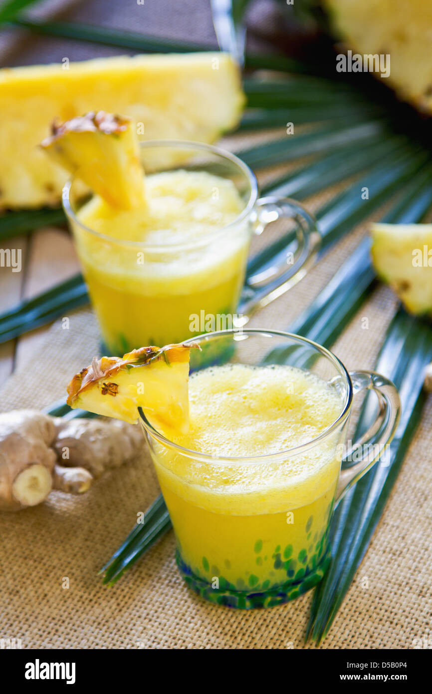 Fresh Pineapple with ginger juice Stock Photo - Alamy