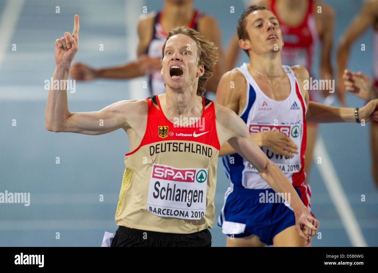 German runner Carsten Schlangen celebrates his second place in the ...