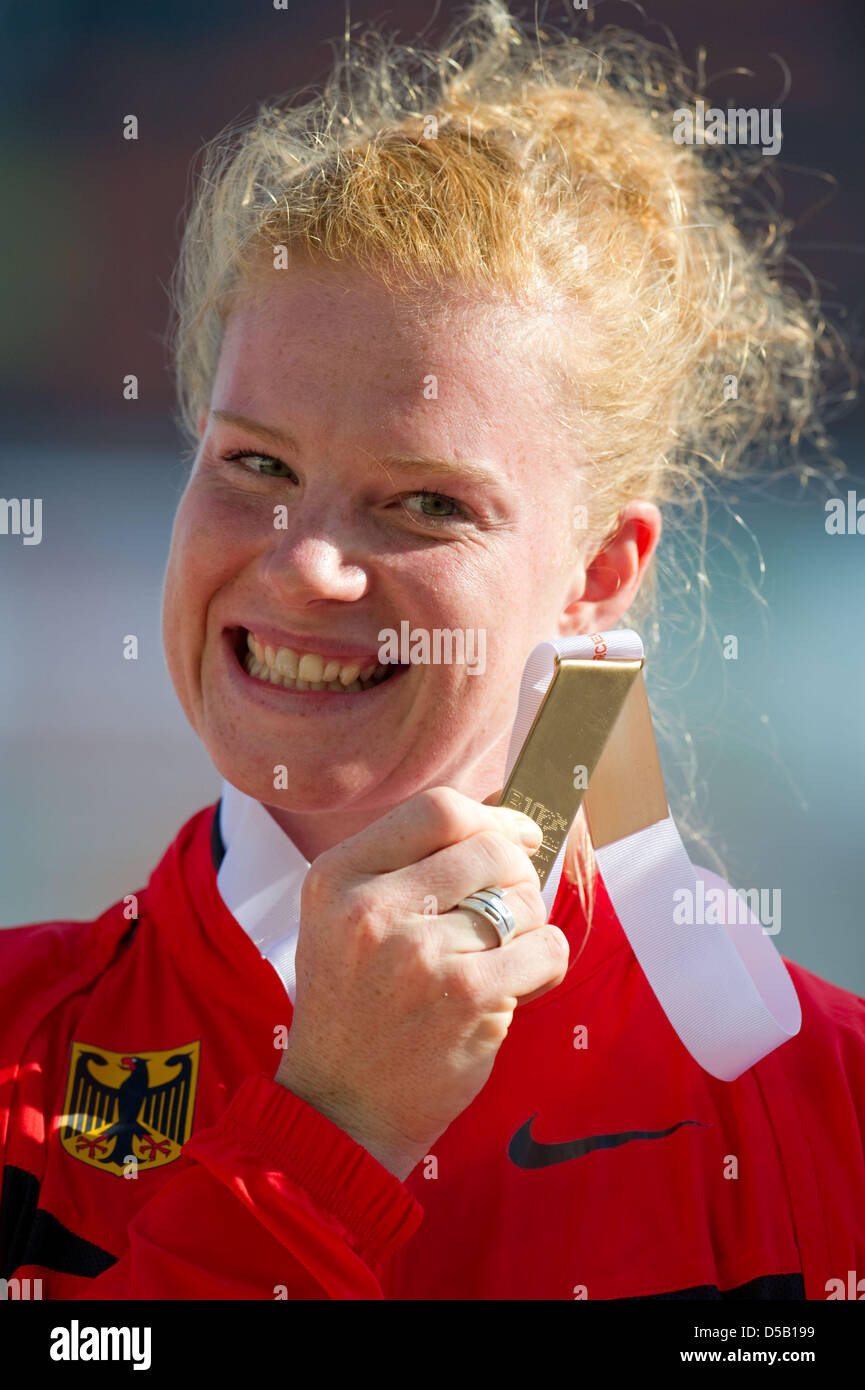 The German hammer thrower Betty Heidler shows her silver medal at the ...
