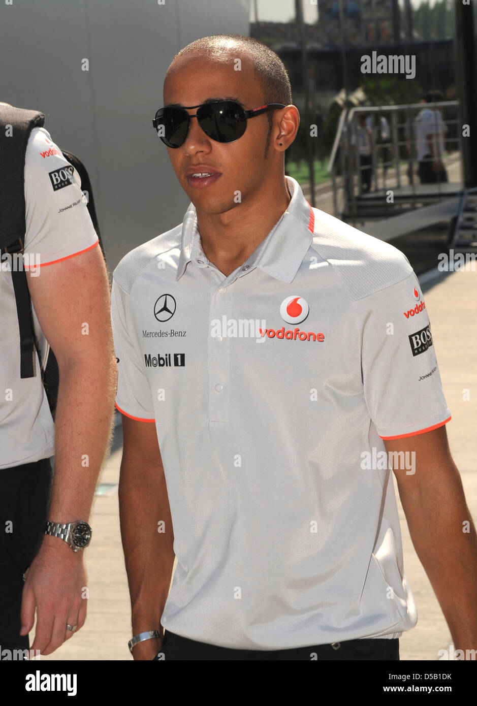 The British race driver Lewis Hamilton from McLaren Mercedes walks on ...