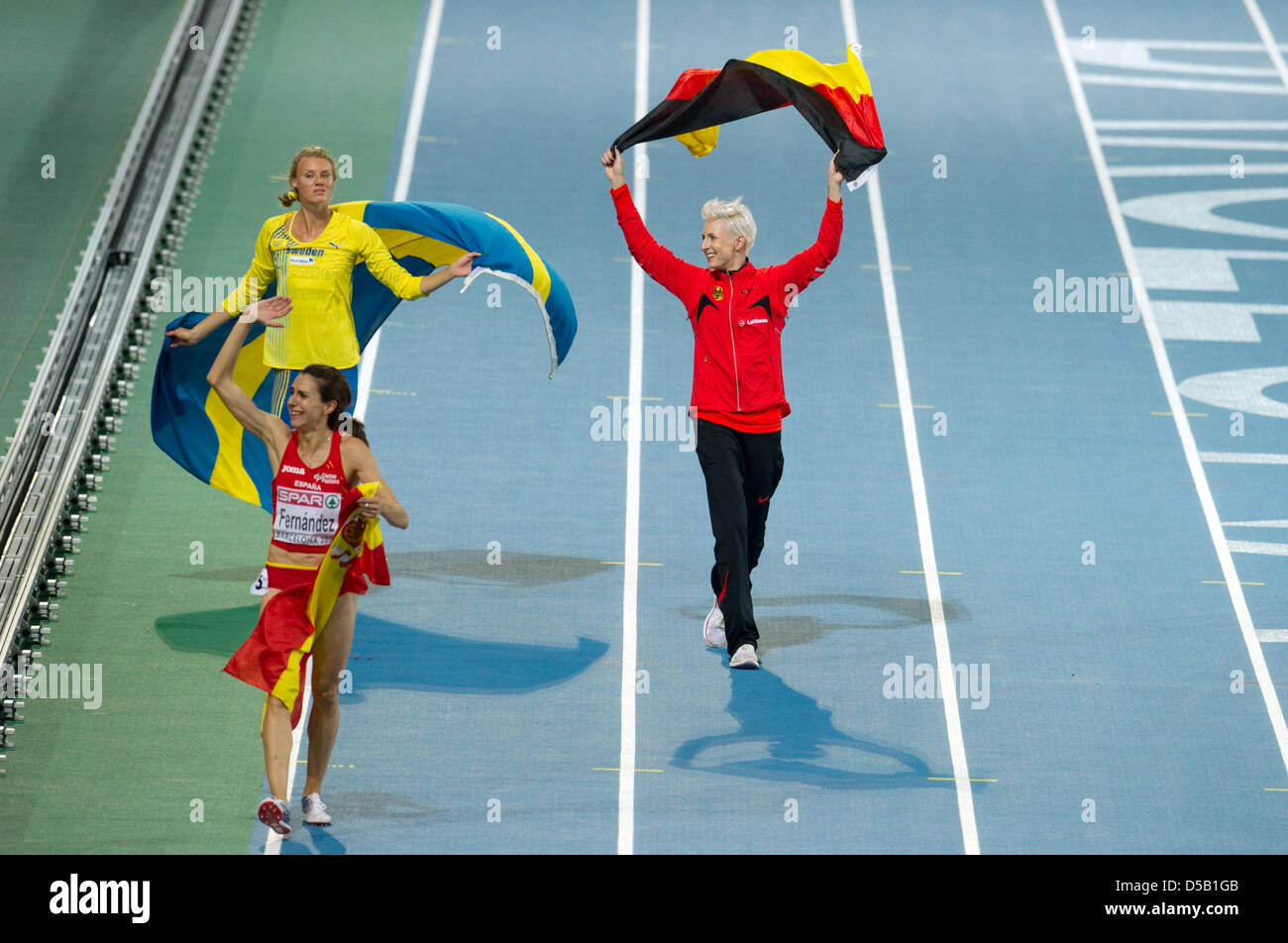 German high jumper Ariane Friedrich (R) celebrates with Swedish silver ...