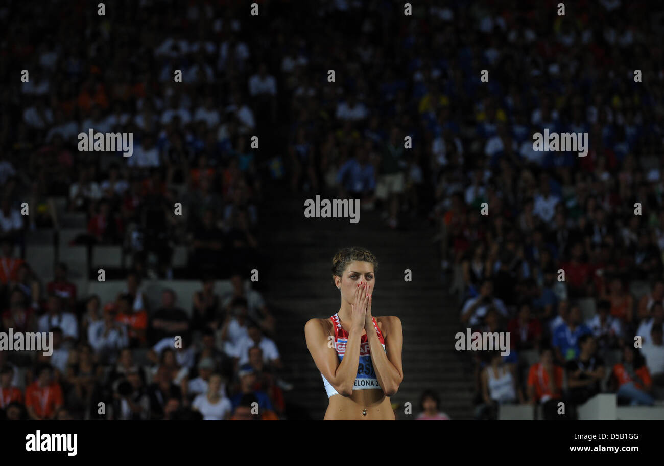 Croatian high jumper Blanka Vlasic clasps her hands to her face at the ...