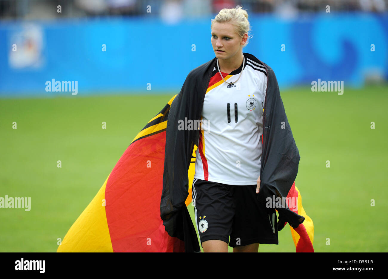 German player Alexandra Popp is draped in a German flag after Germany ...