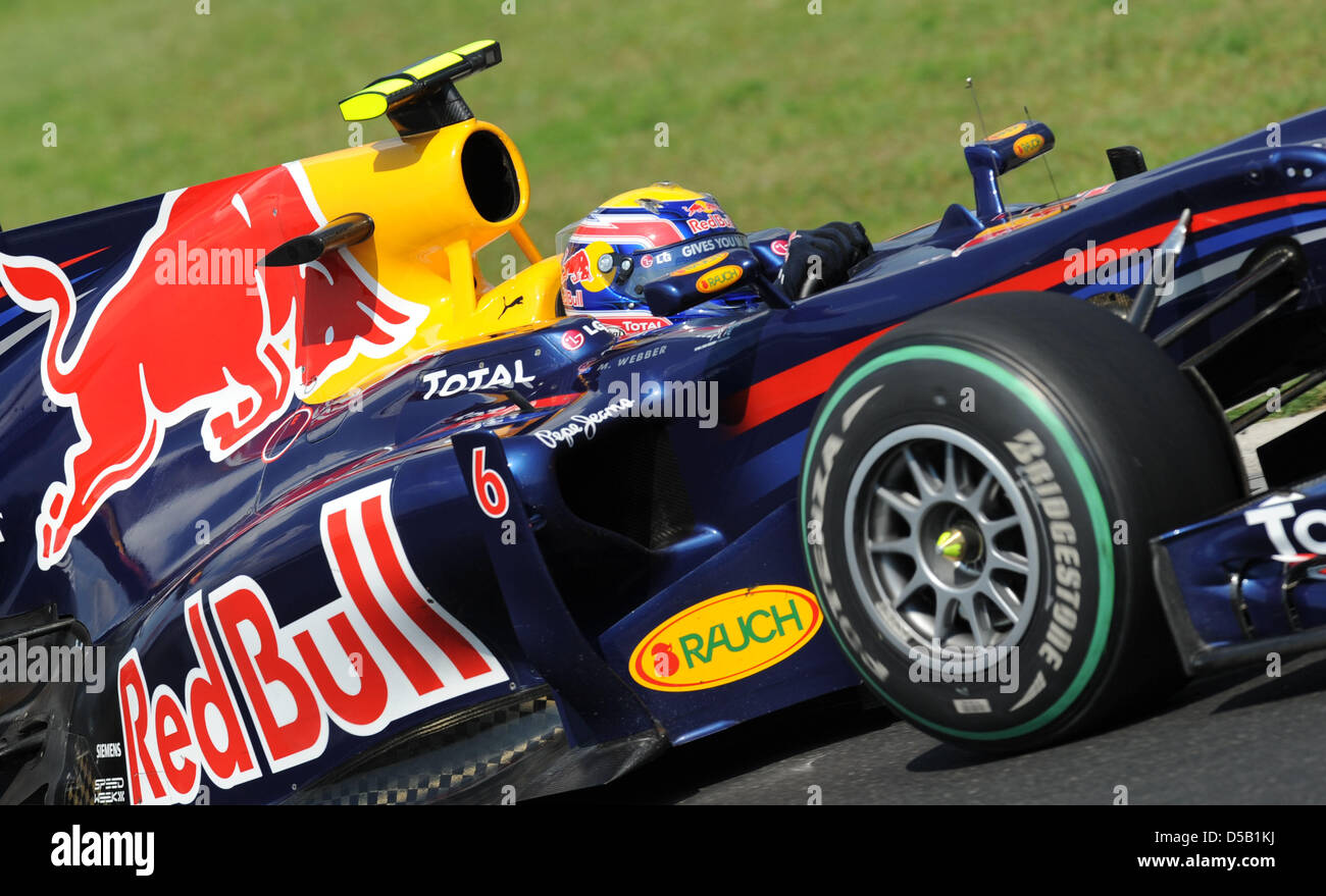 Australian driver Mark Webber of Team Red Bull drives through a turn ...