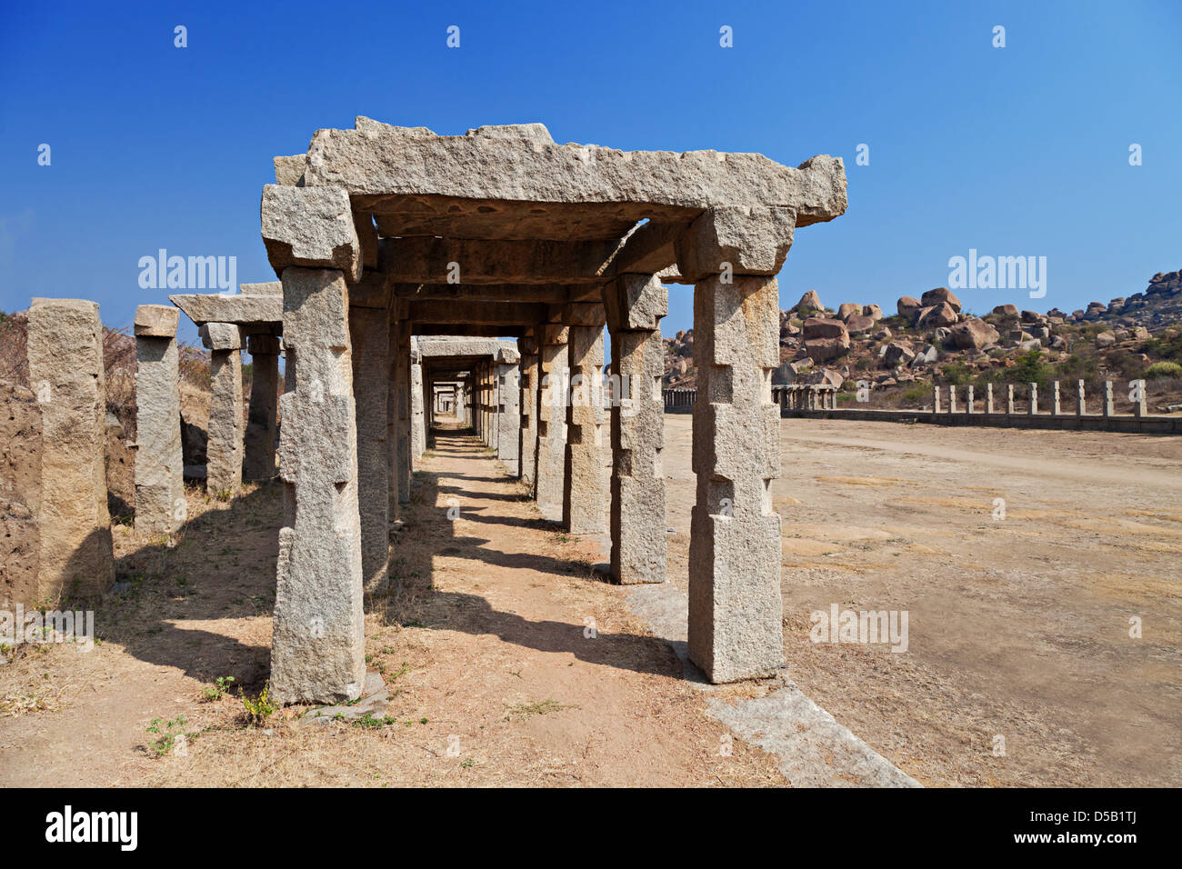 Pillars of the ruined temple, Hampi, India Stock Photo - Alamy