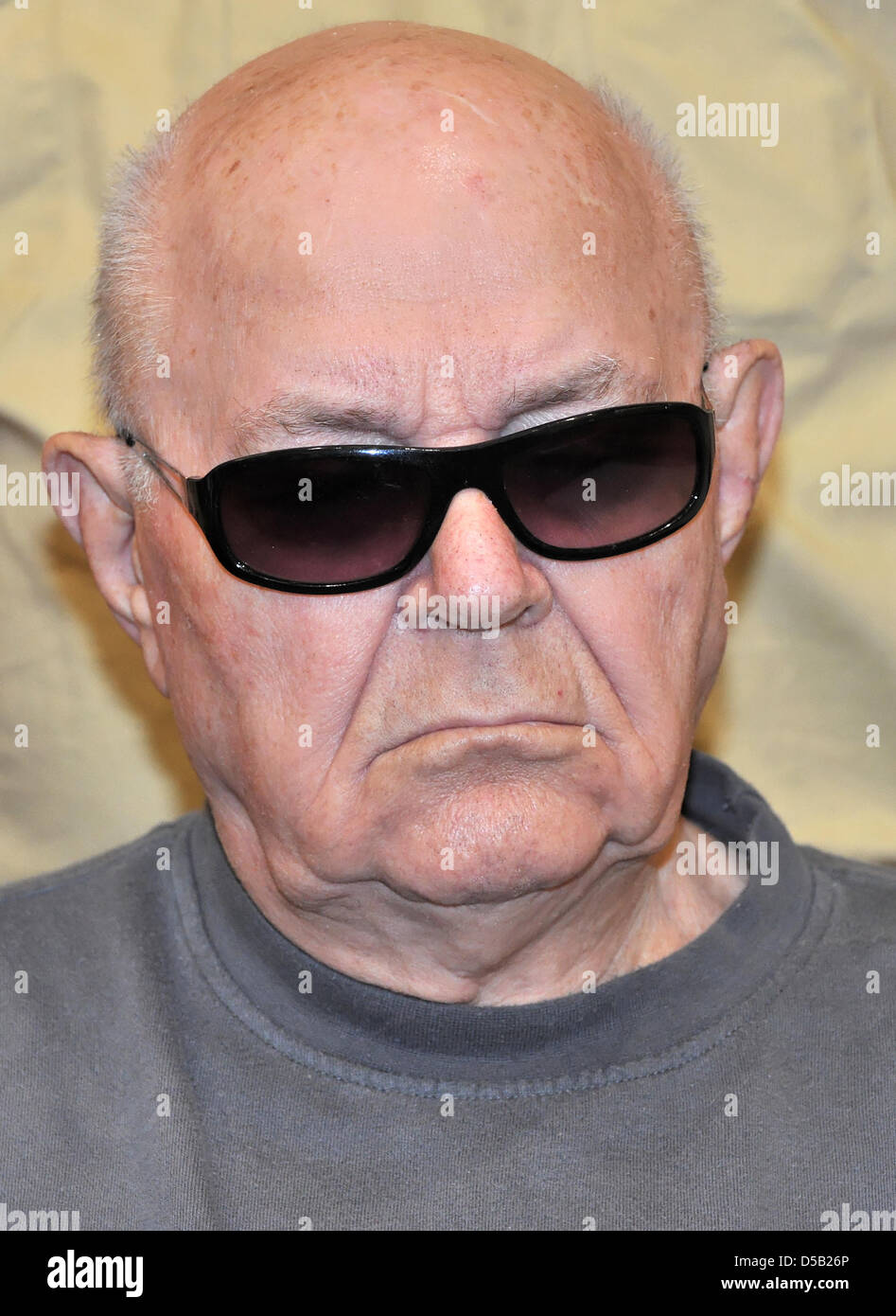 The suspected war criminal John Demjanjuk is brought into the courtroom ...