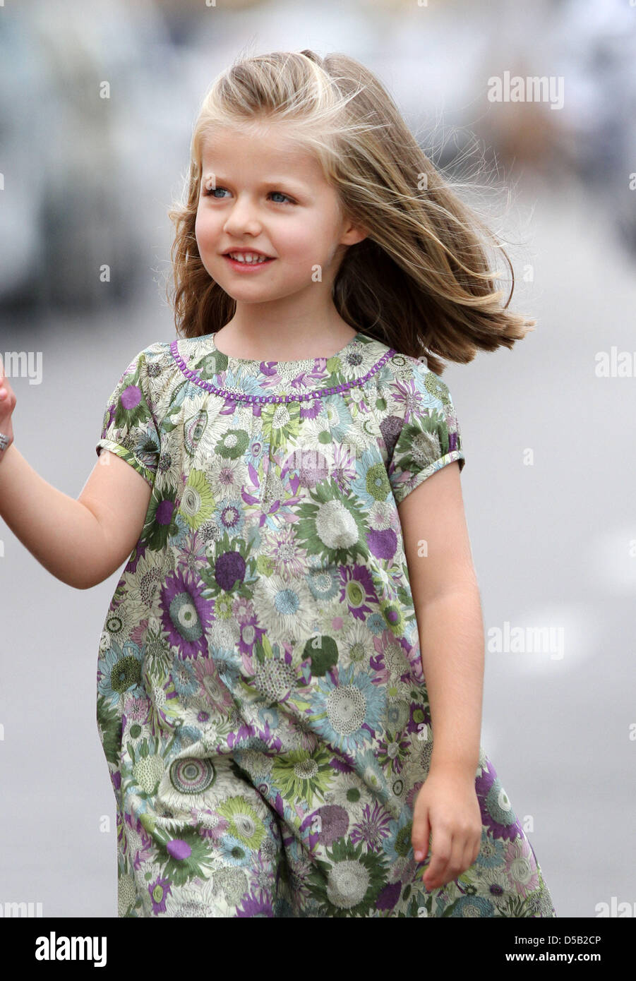 Spanish Princess Leonor smiles while she walks across a street on the ...