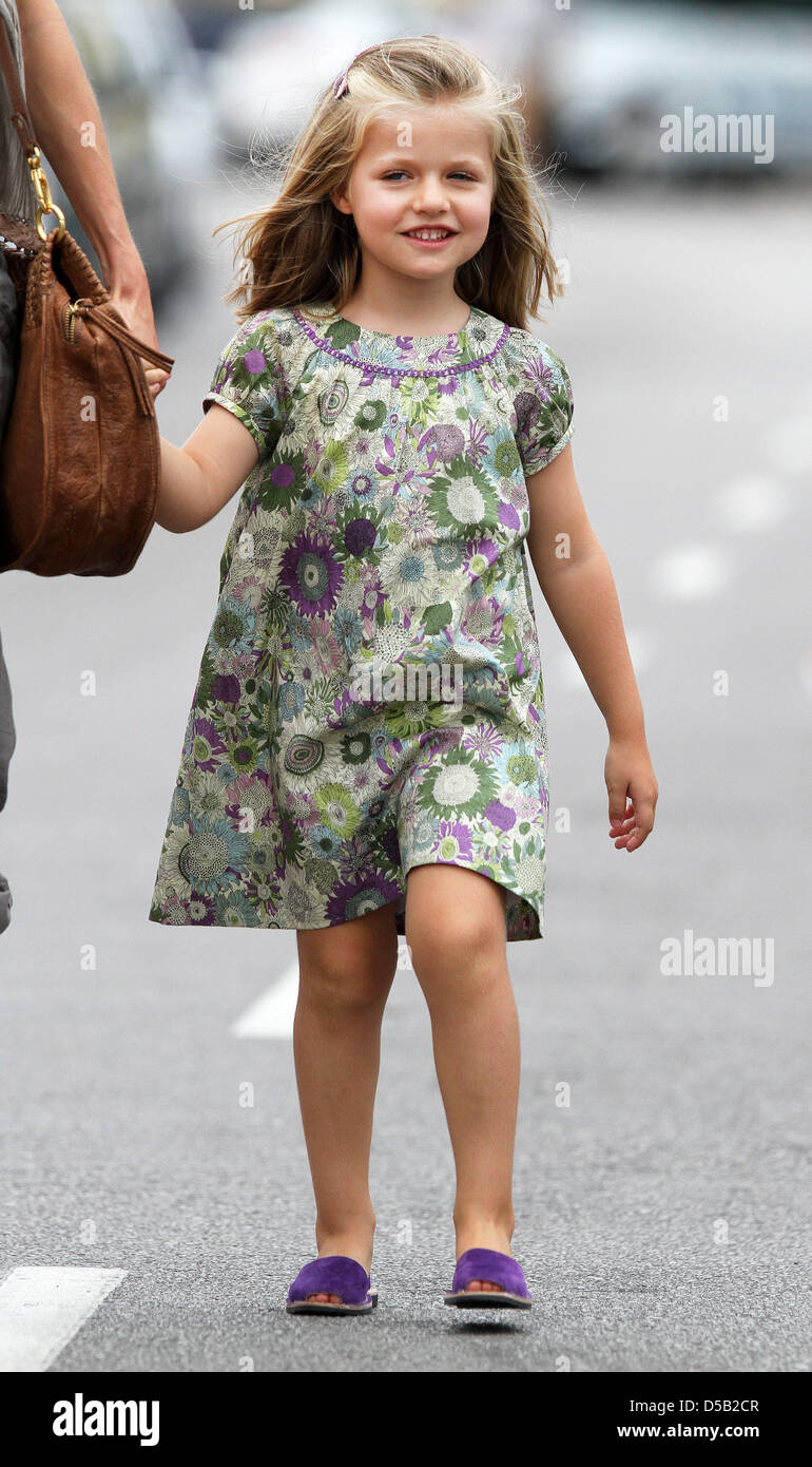Spanish Princess Leonor smiles while she walks across a street on the ...