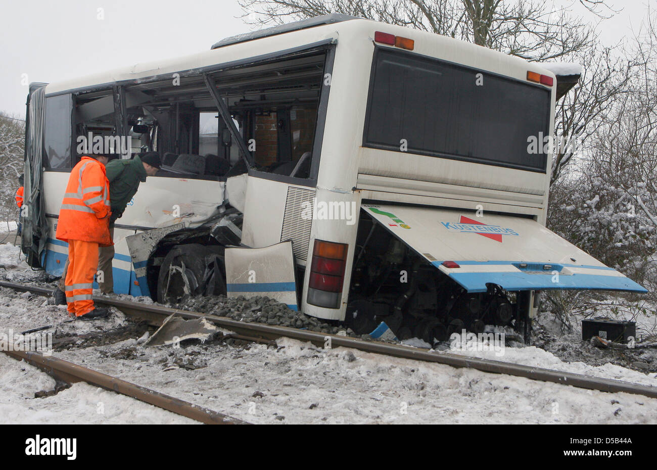 After a collision between a school bus and a reginoal train, the bus ...