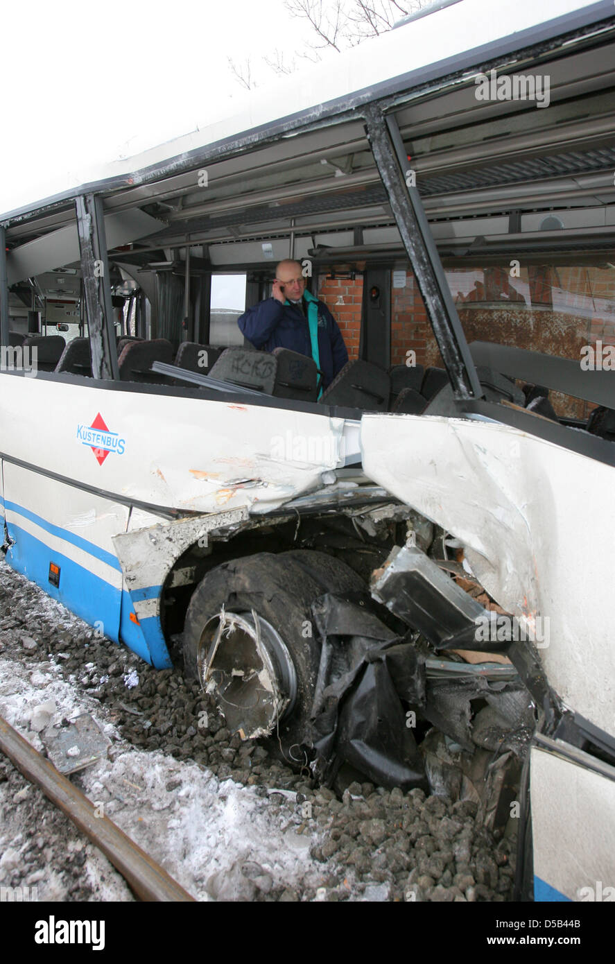 After a collision between a school bus and a reginoal train, the bus ...