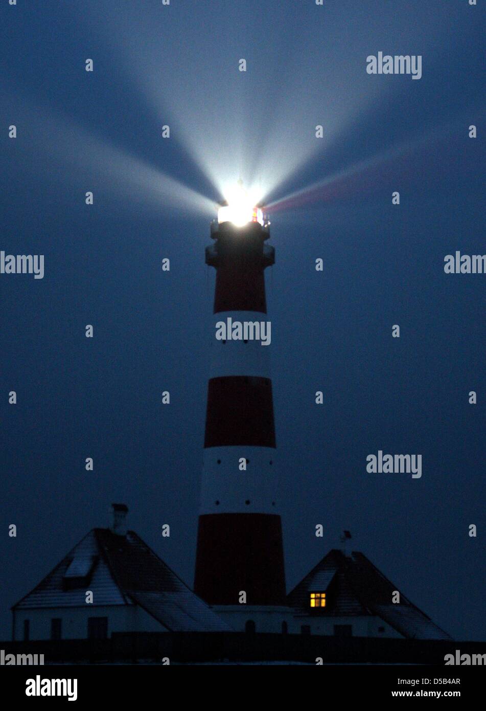 The light shines in the lighthouse in Westerhever, Germany, 05 January ...