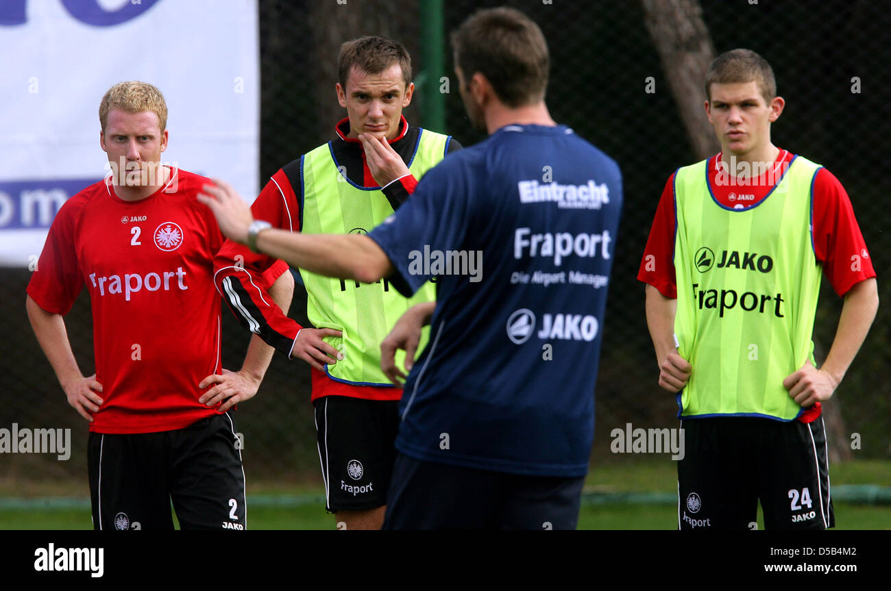 German Bundesliga Eintracht Frankfurt's coach Michael Skibbe (C) talks ...