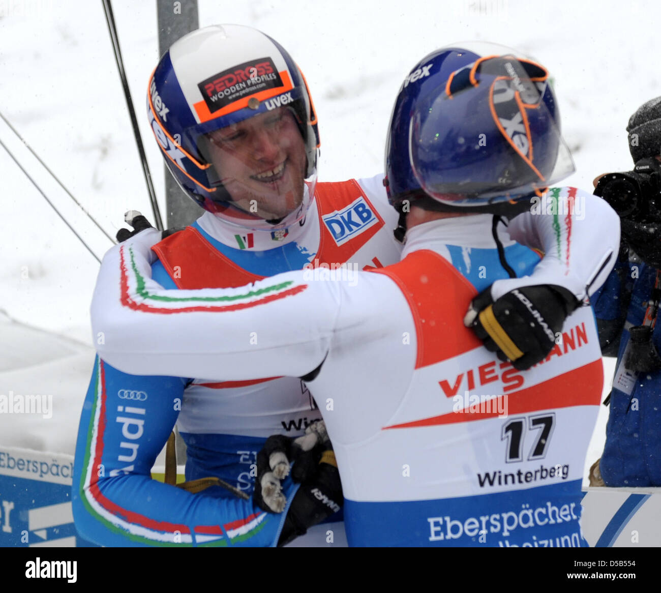 Italians Christian Oberstolz and Patrick Gruber celebrate after the two ...