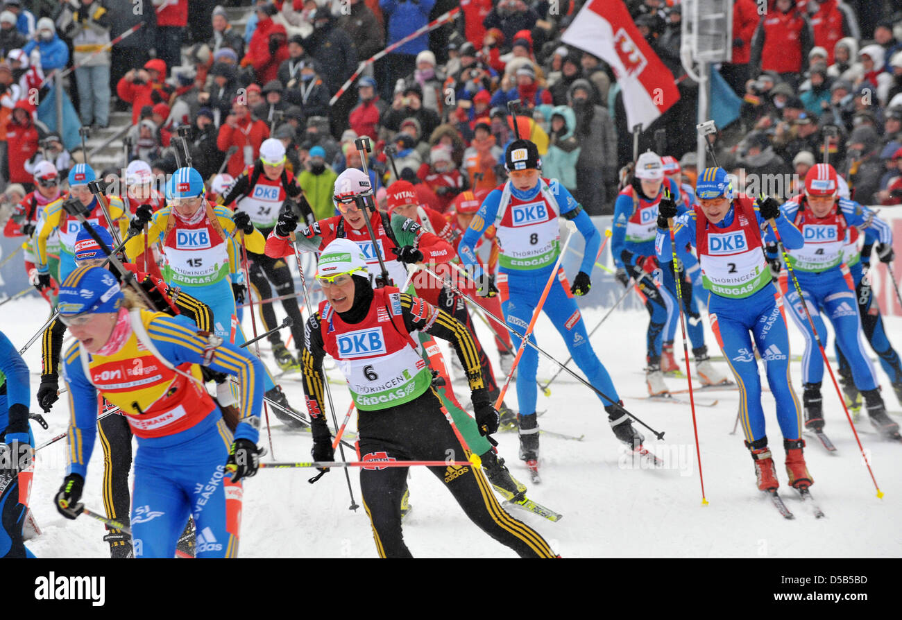 Thirty biathletes start during the during the mass start competition at ...