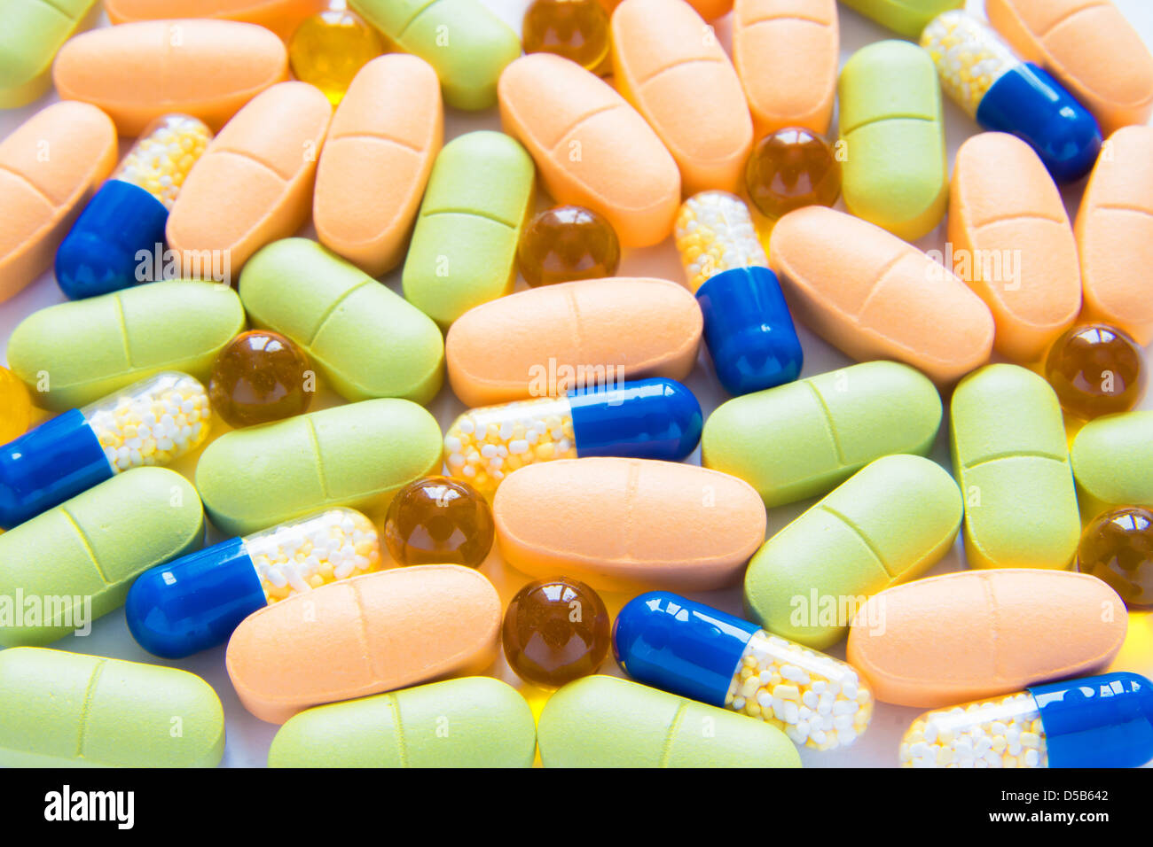 Pills tablets isolated on white Stock Photo - Alamy
