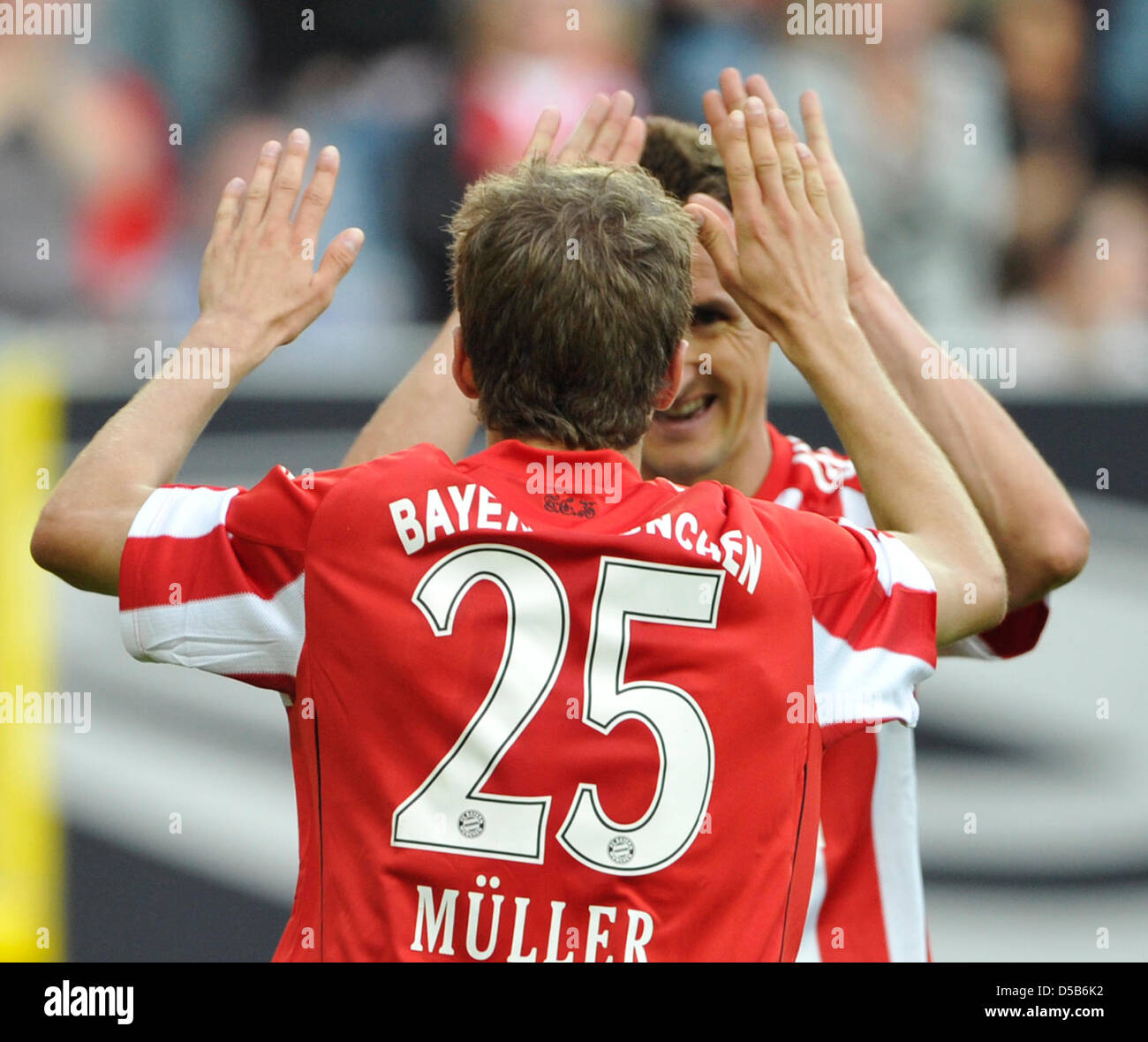 Bayern Munich's Thomas Mueller thanks his teammate Miroslav Klose for ...