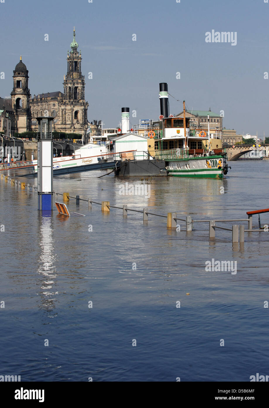 The jetties of historical steamboats are submerged in water in Dresden ...