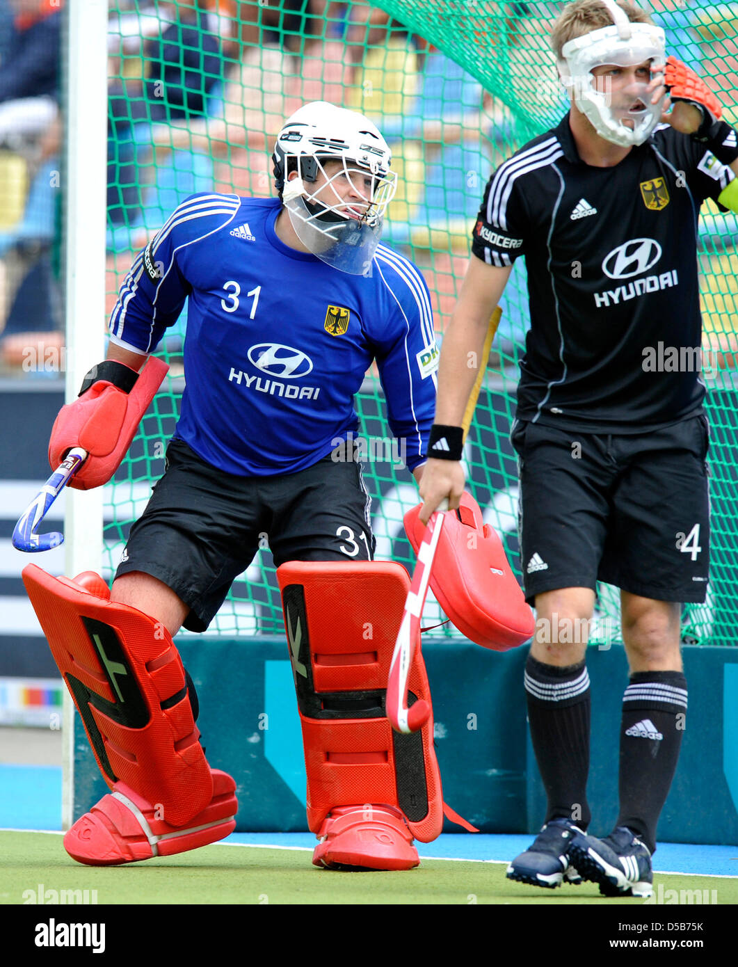 German players Tim Jessulat (L) and Maximilian Mueller (R) gaze after ...