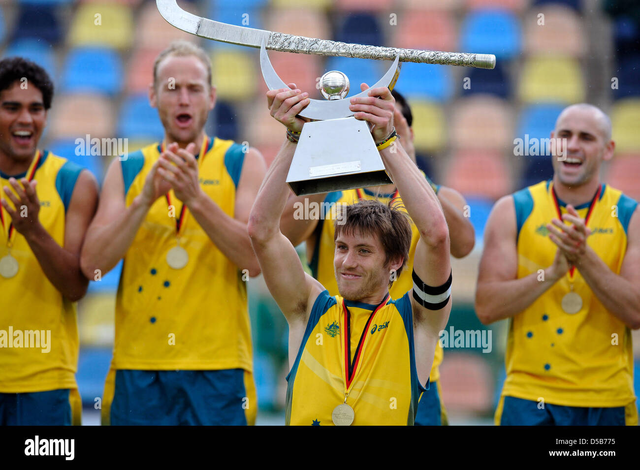 The Australians with team captain Edward Ockenden (2-R) celebrate their ...