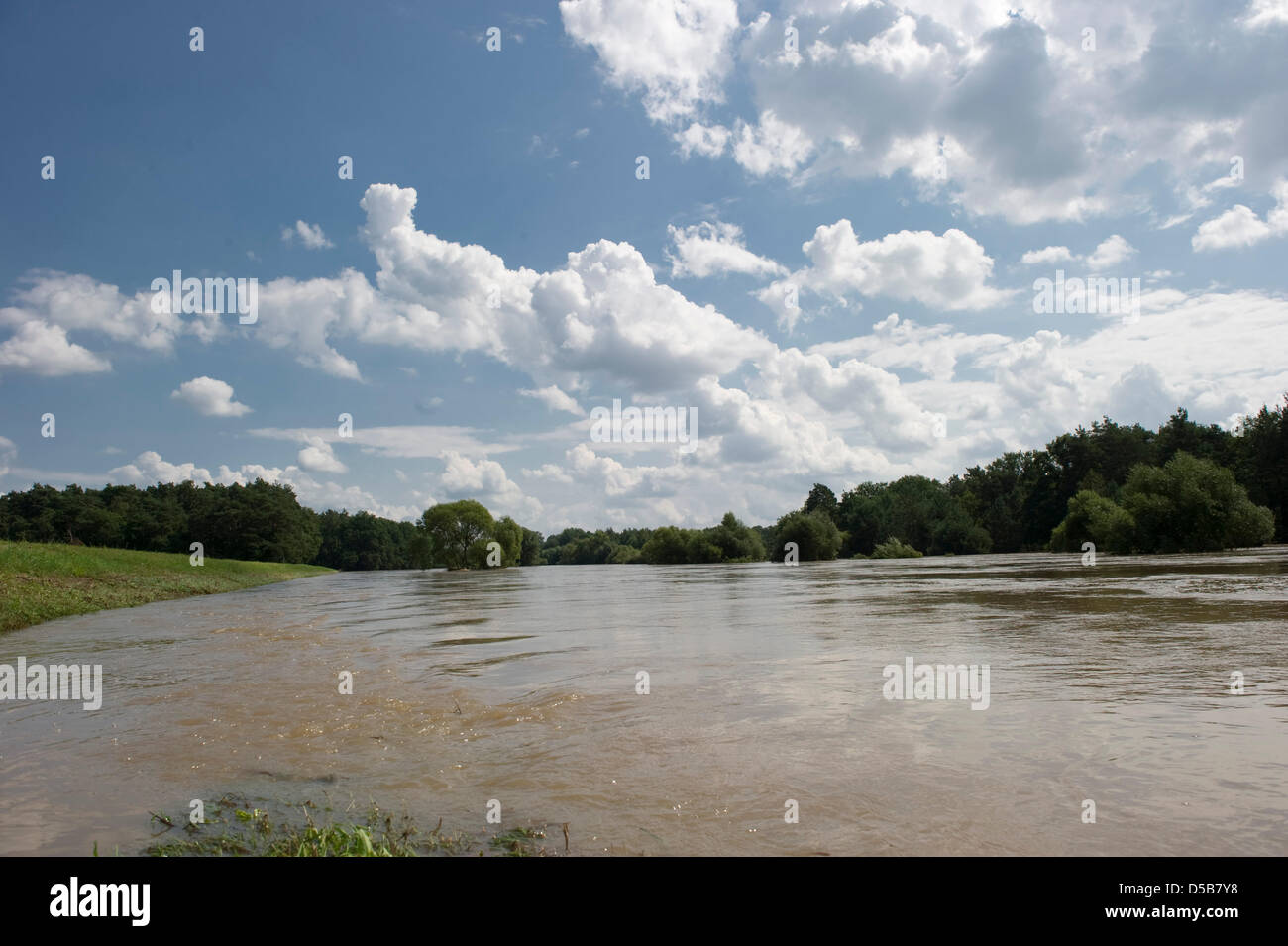 Unusually wide is the river Nysa, due to flood waters, between ...