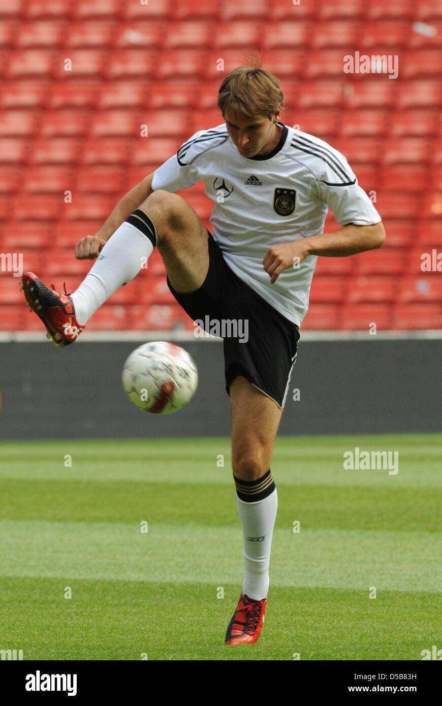 Feet of red team soccer player hi-res stock photography and images - Alamy