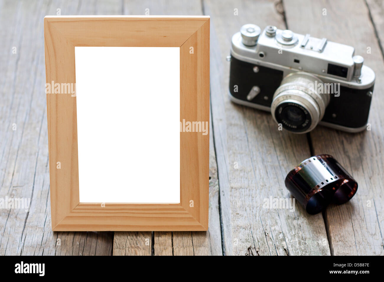 Old empty photos frame with retro camera background concept Stock Photo ...