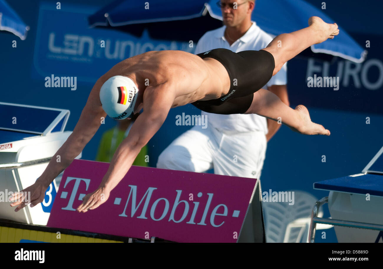 Germann swimmer Paul Biedermann leaps into the pool in the men's 200 ...
