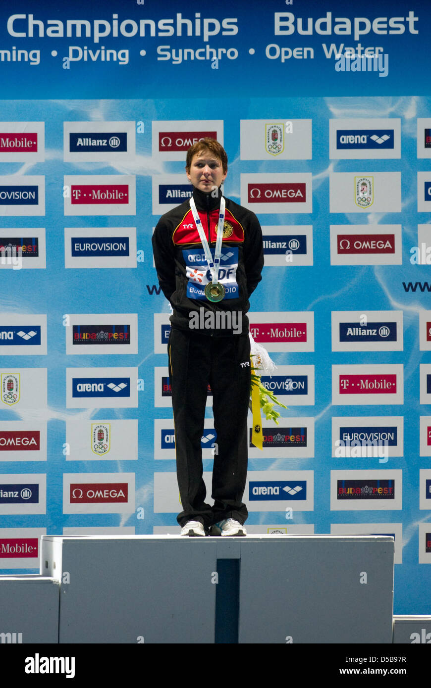 German diver Christin Steuer stands on the winner's podium during the ...