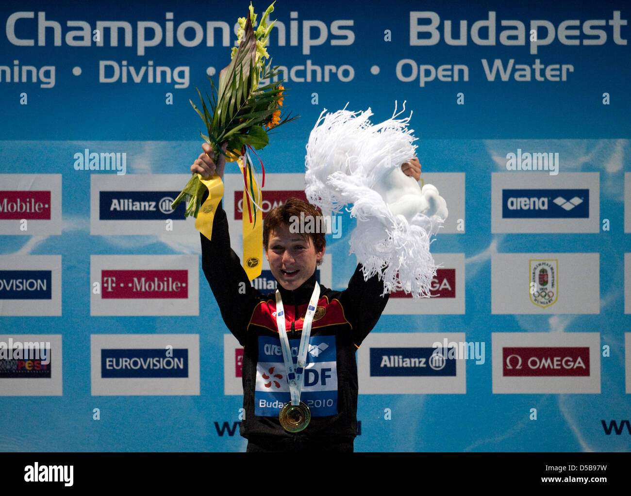 German diver Christin Steuer cheers during the award ceremony following ...