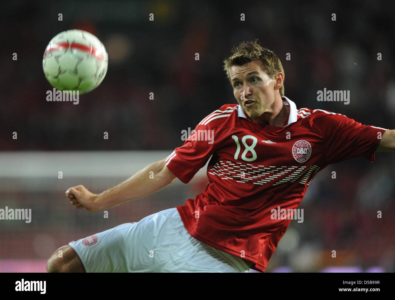 Denmark's Mads Junker controls the ball during a friendly match against ...