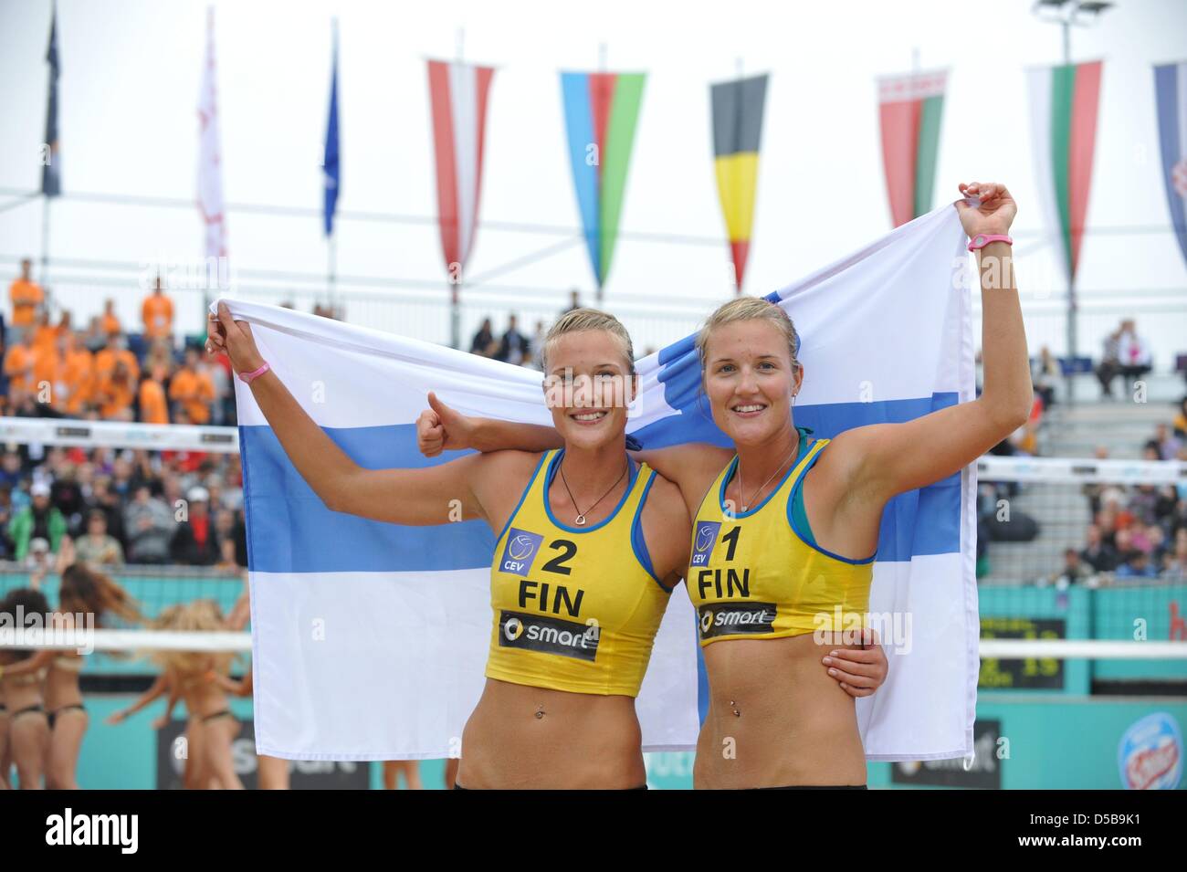 Finland's Erika (L) and Emilia Nystrom celebrate their third place at ...