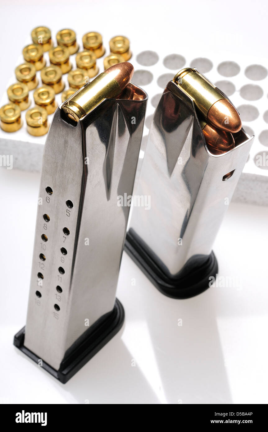 Loaded 9 mm/16 round semi-automatic magazines or clips with tray of ...