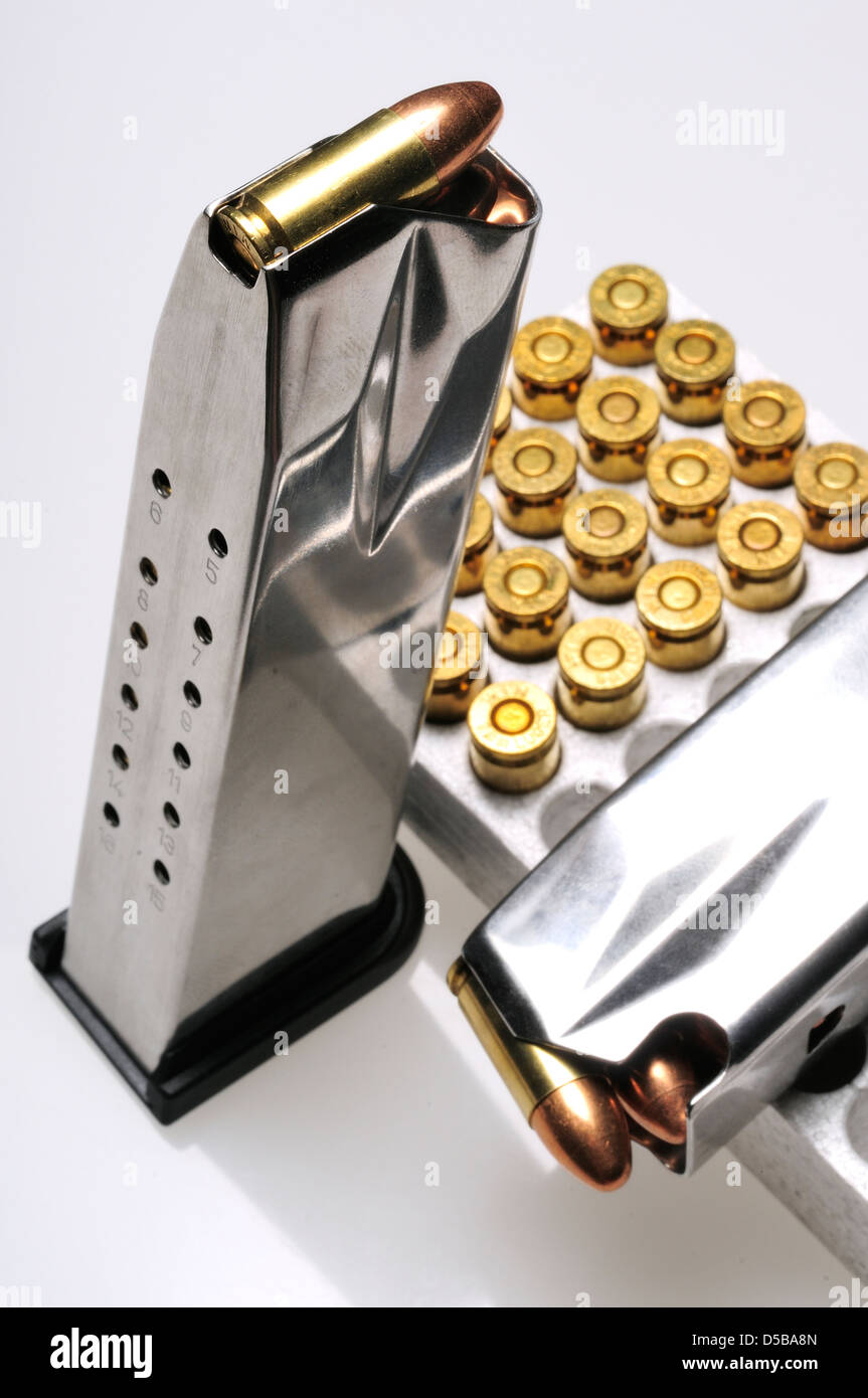 Loaded 9 mm/16 round semi-automatic magazines or clips with tray of ...