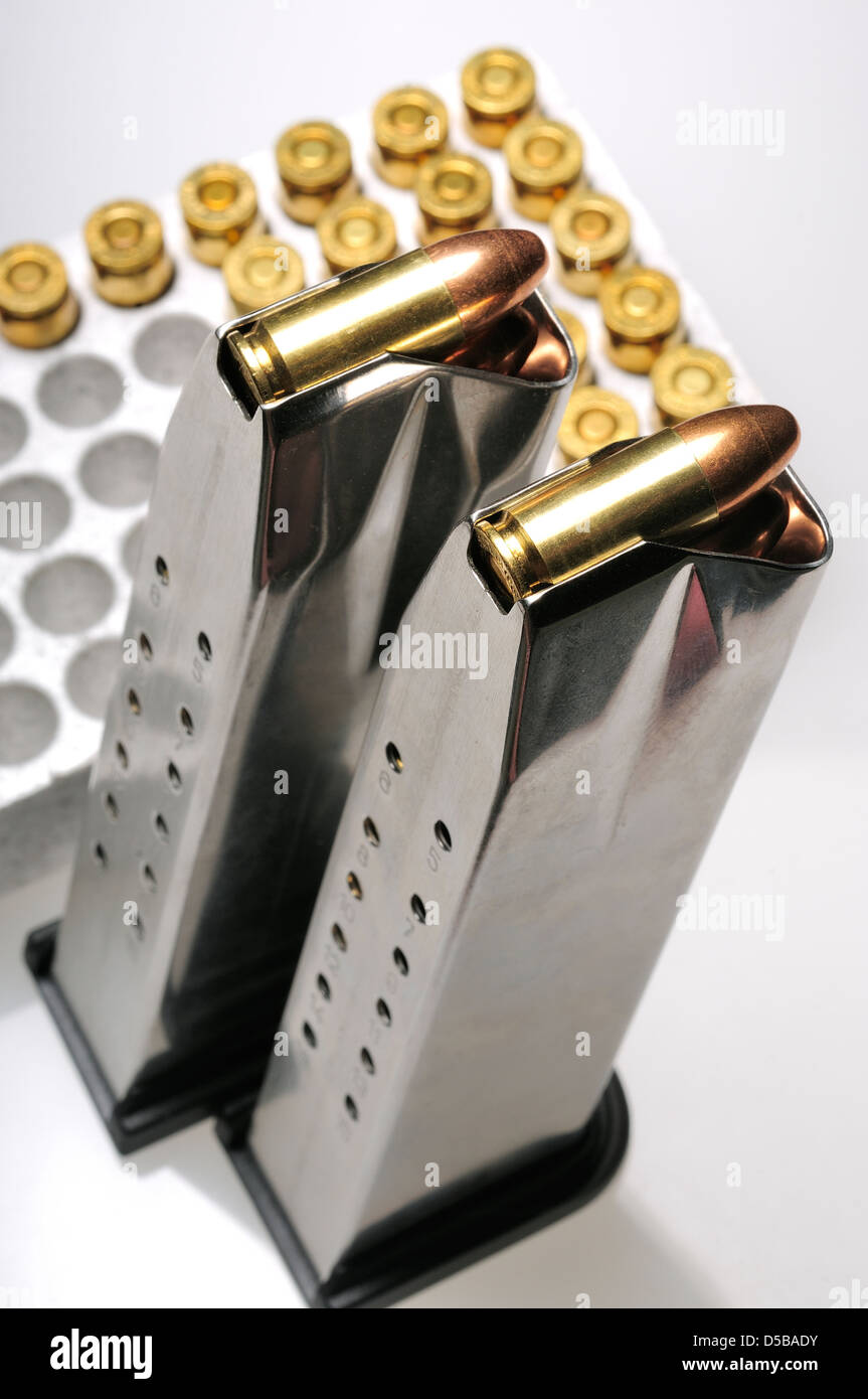 Loaded 9 mm/16 round semi-automatic magazines or clips with tray of ...