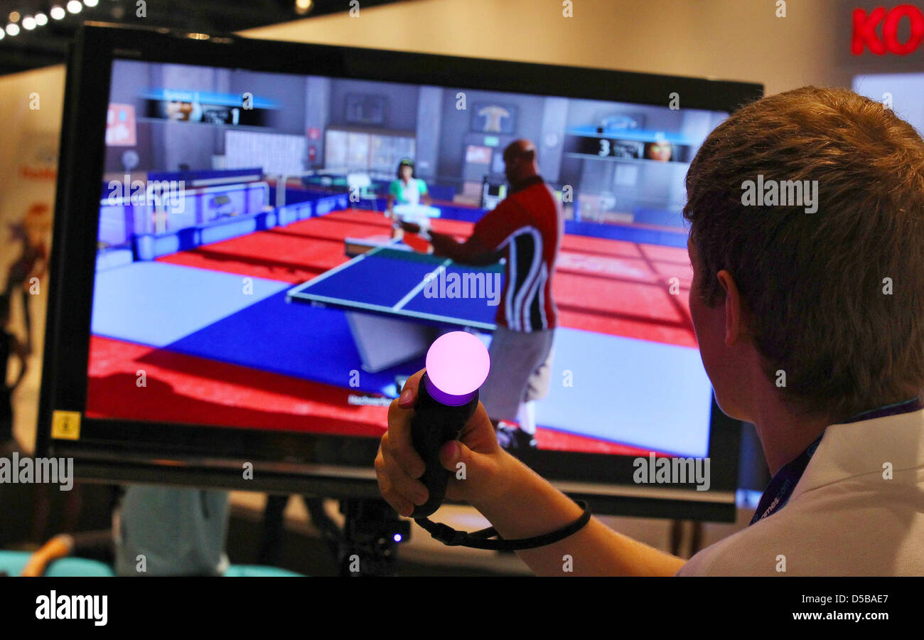 A man tests a motion-controlled game at the booth of Nintendo during ...