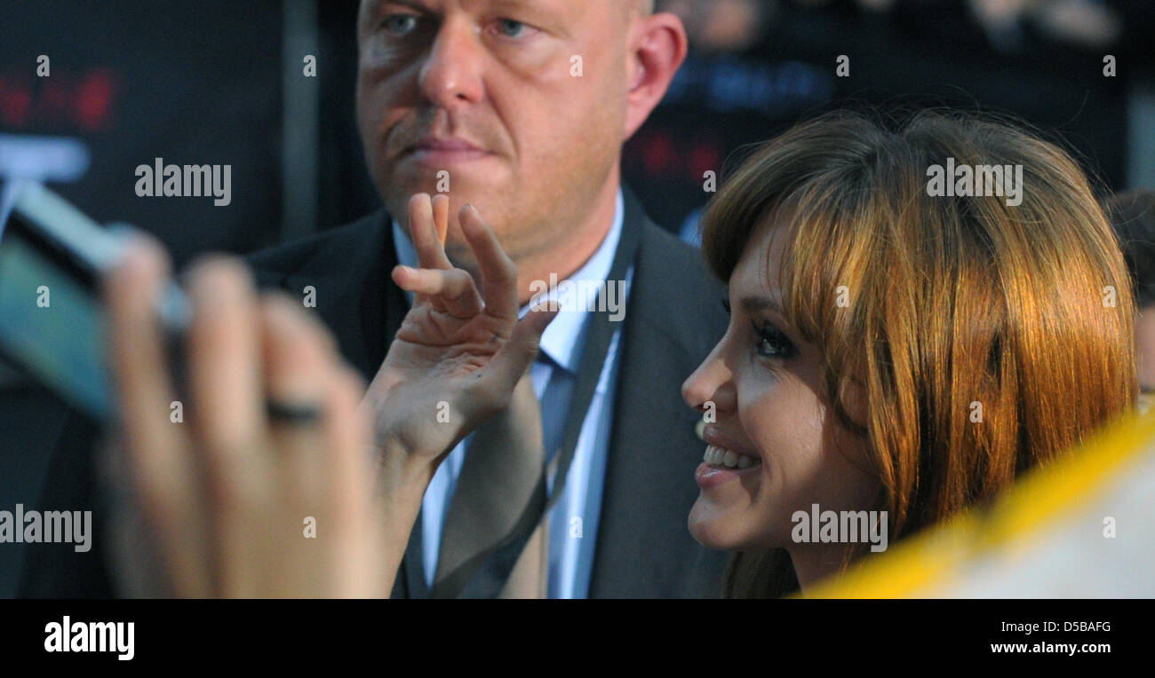 US actress Angelina Jolie (R) attends the premiere of her new movie ...