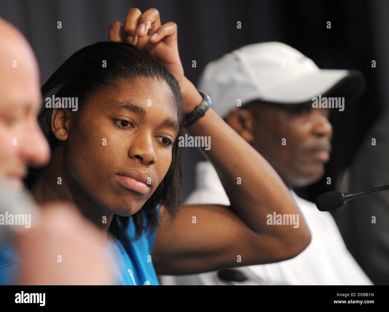 South African athlete Caster Semenya (C) and her coach Michael Seme (R ...