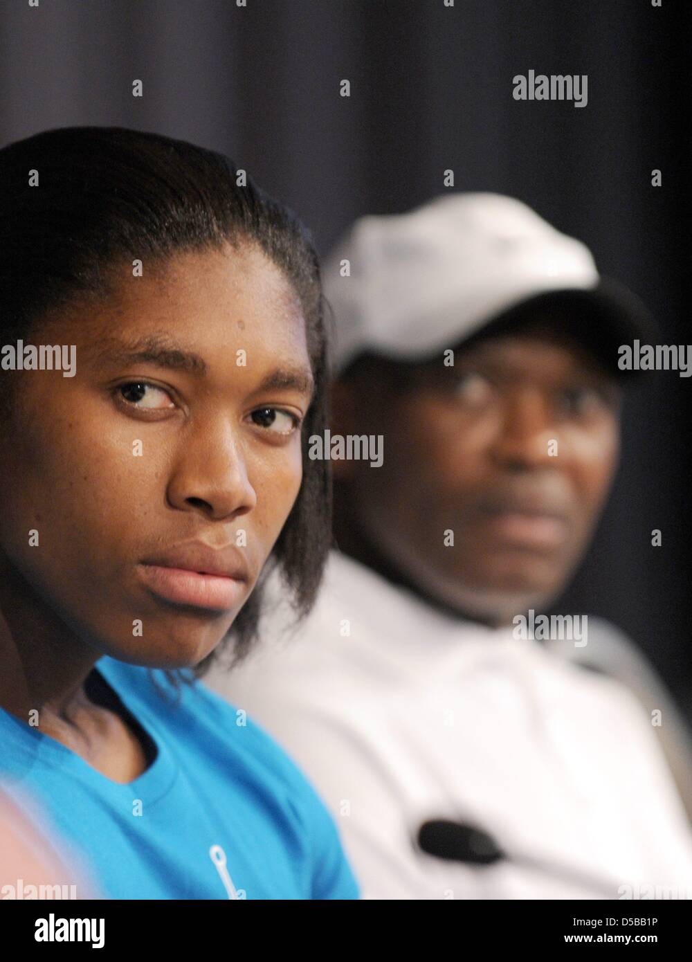 South African athlete Caster Semenya (C) and her coach Michael Seme (R ...