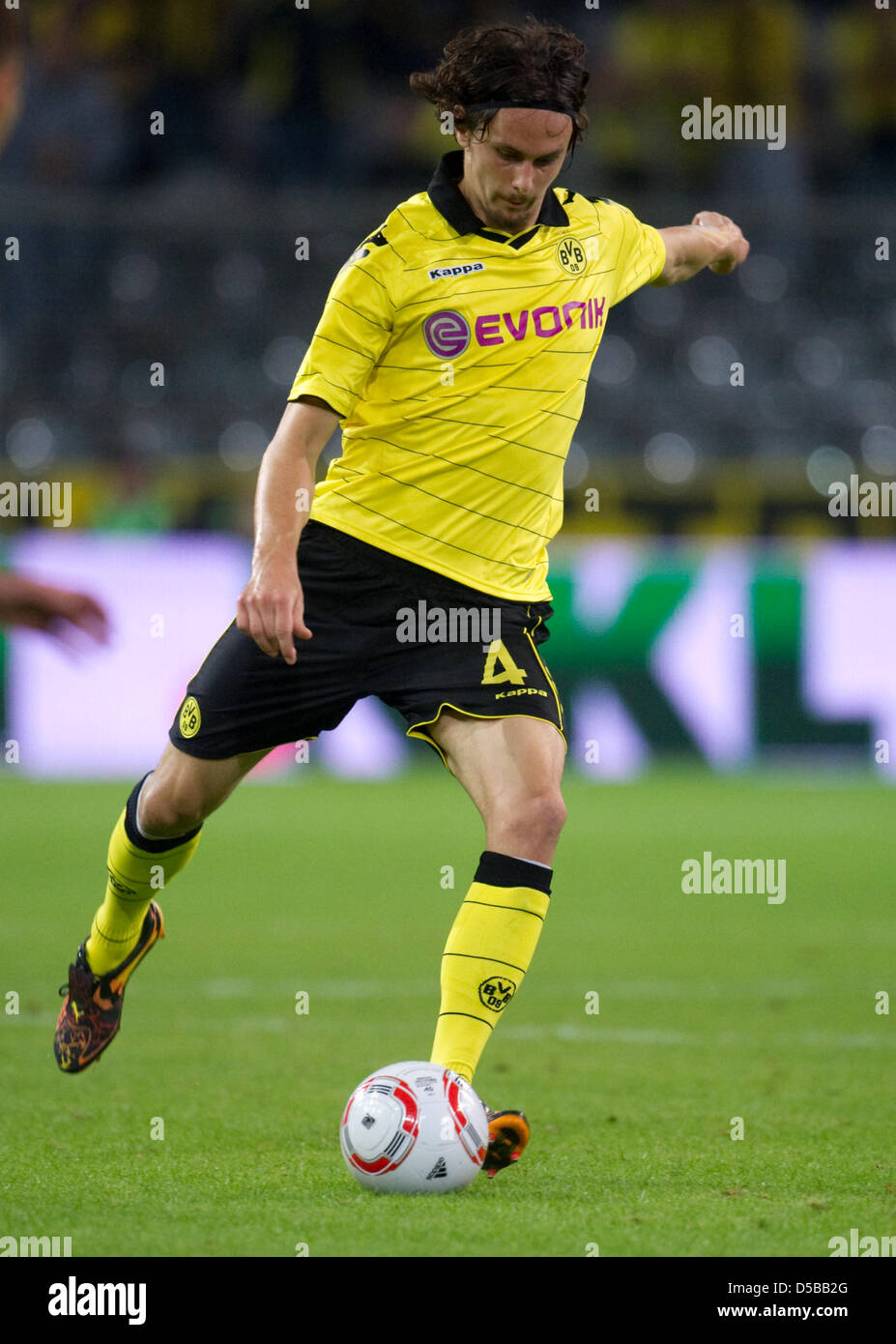 Dortmund's Neven Subotic shoots the ball during UEFA Europa League play ...