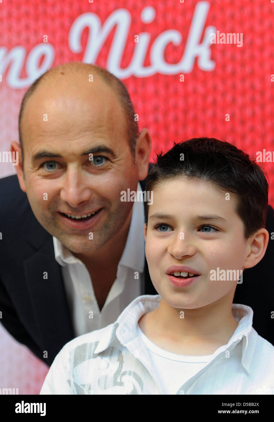 French director Laurent Tirard (L) and teen actor Maxime Godart pose ...