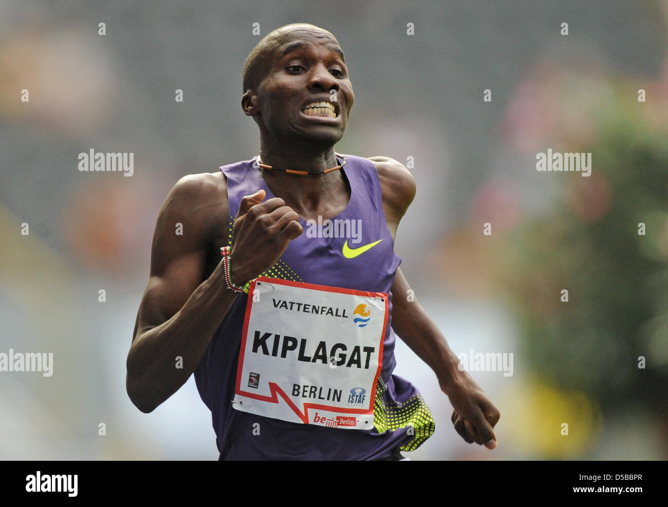 Kenyan runner Silas Kiplagat is the first to cross the finish linbe ...