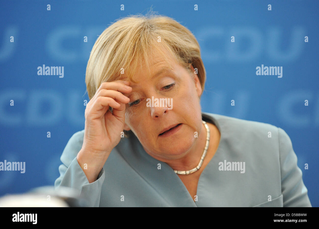 German Chancellor Angela Merkel gestures during a meeting of her ...
