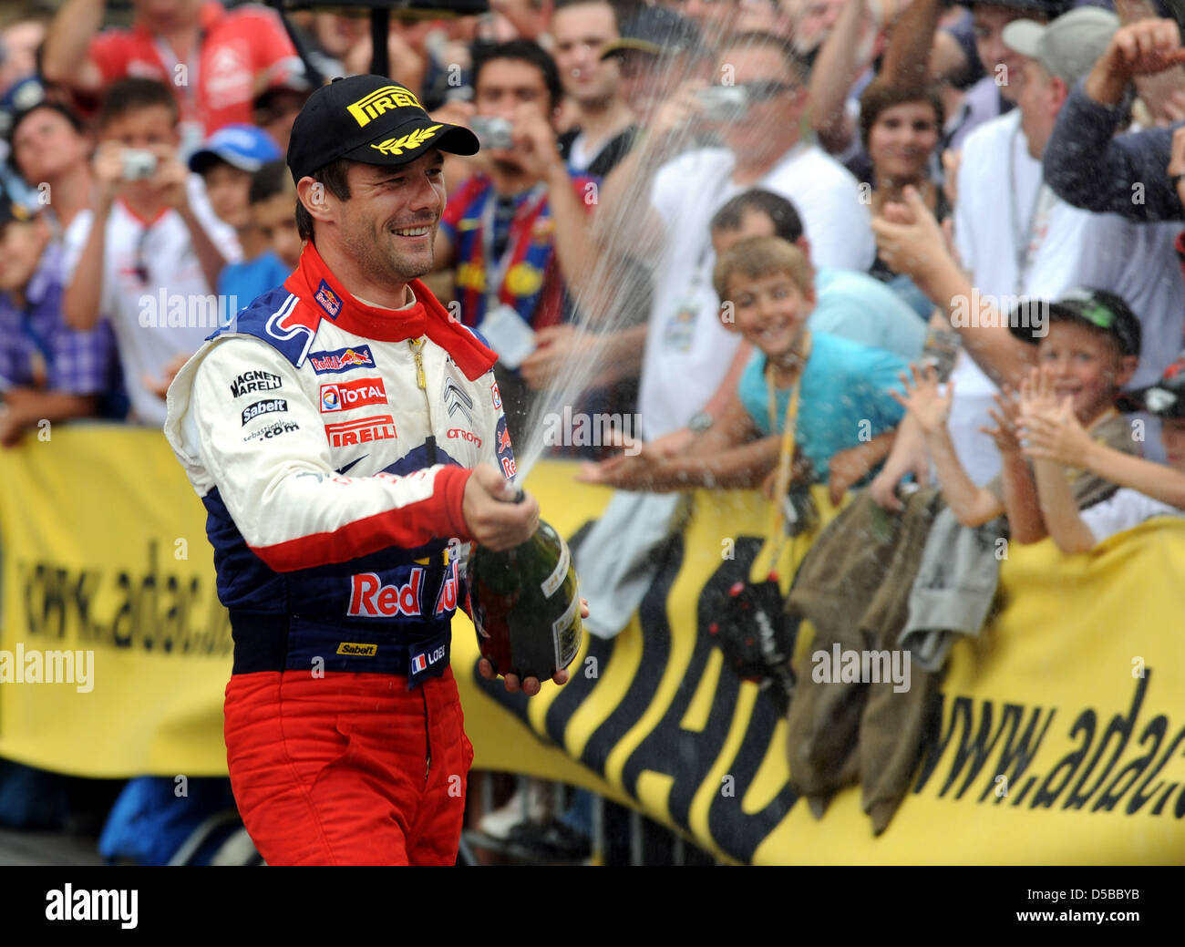 French driver Sebastian Loeb of Citroen celebrates his victory at the ...