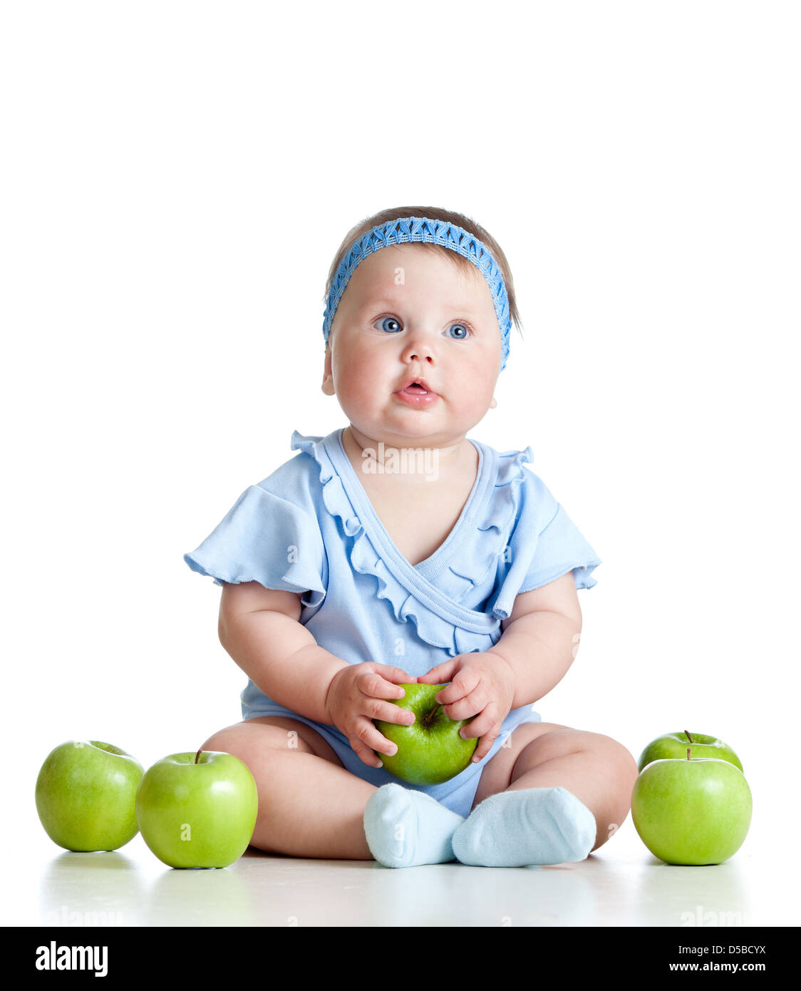 Adorable kid with green apples isolated on white background Stock Photo ...