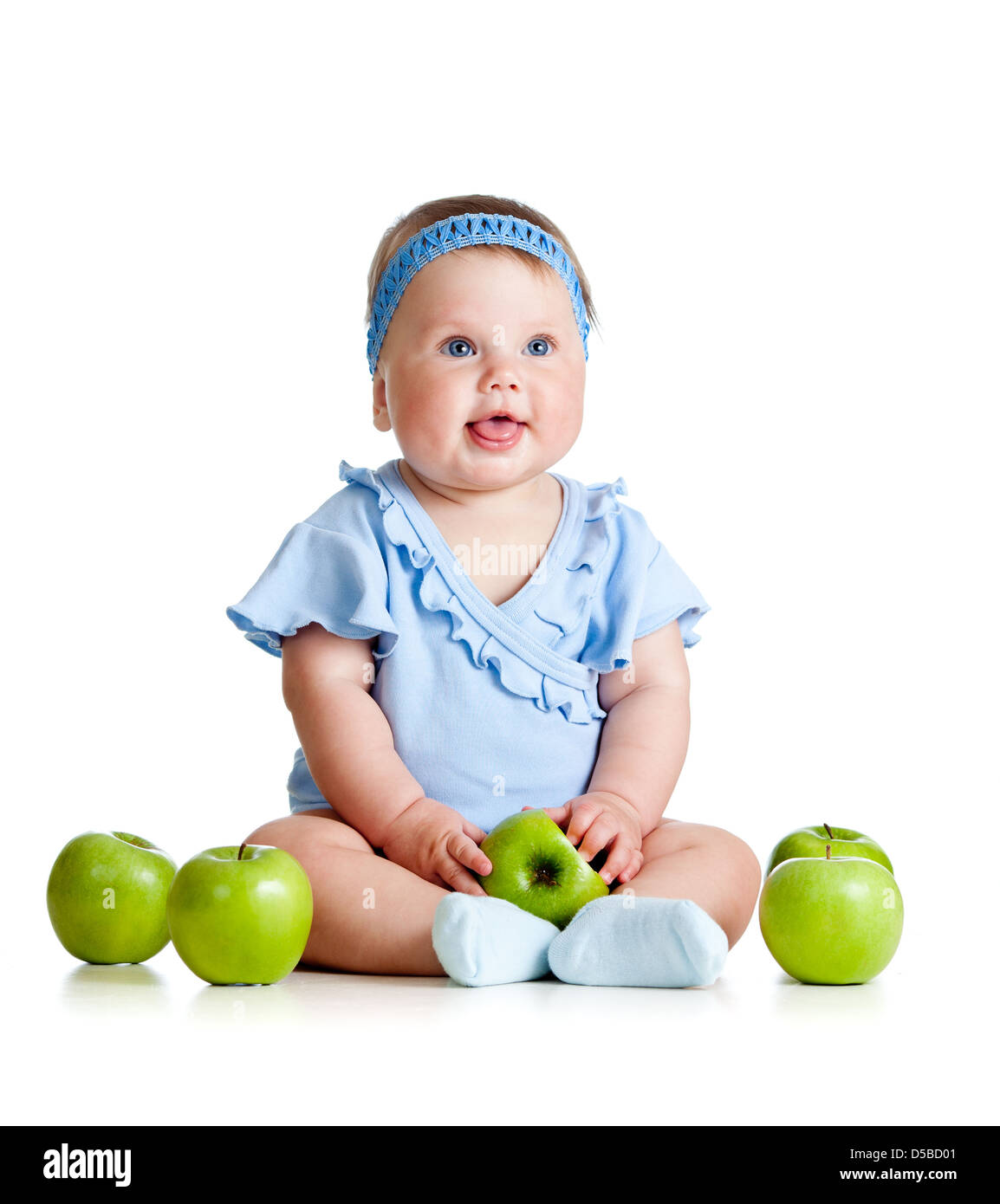 Funny baby girl with green apples isolated on white background Stock ...