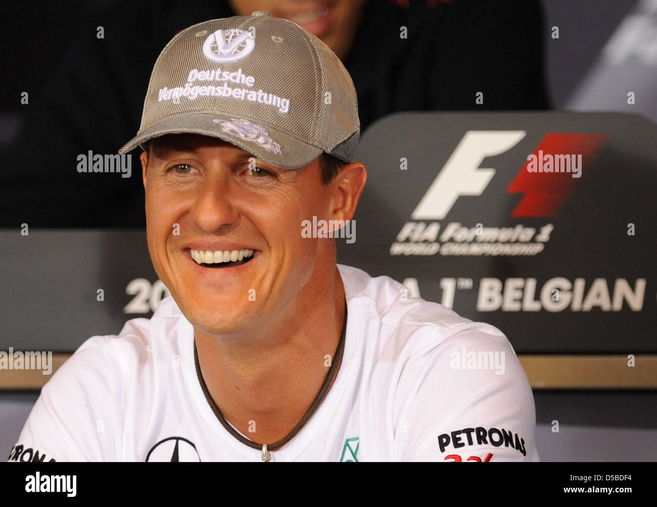 German driver Michael Schumacher of Mercedes Grand Prix smiles during the official FIA press ...