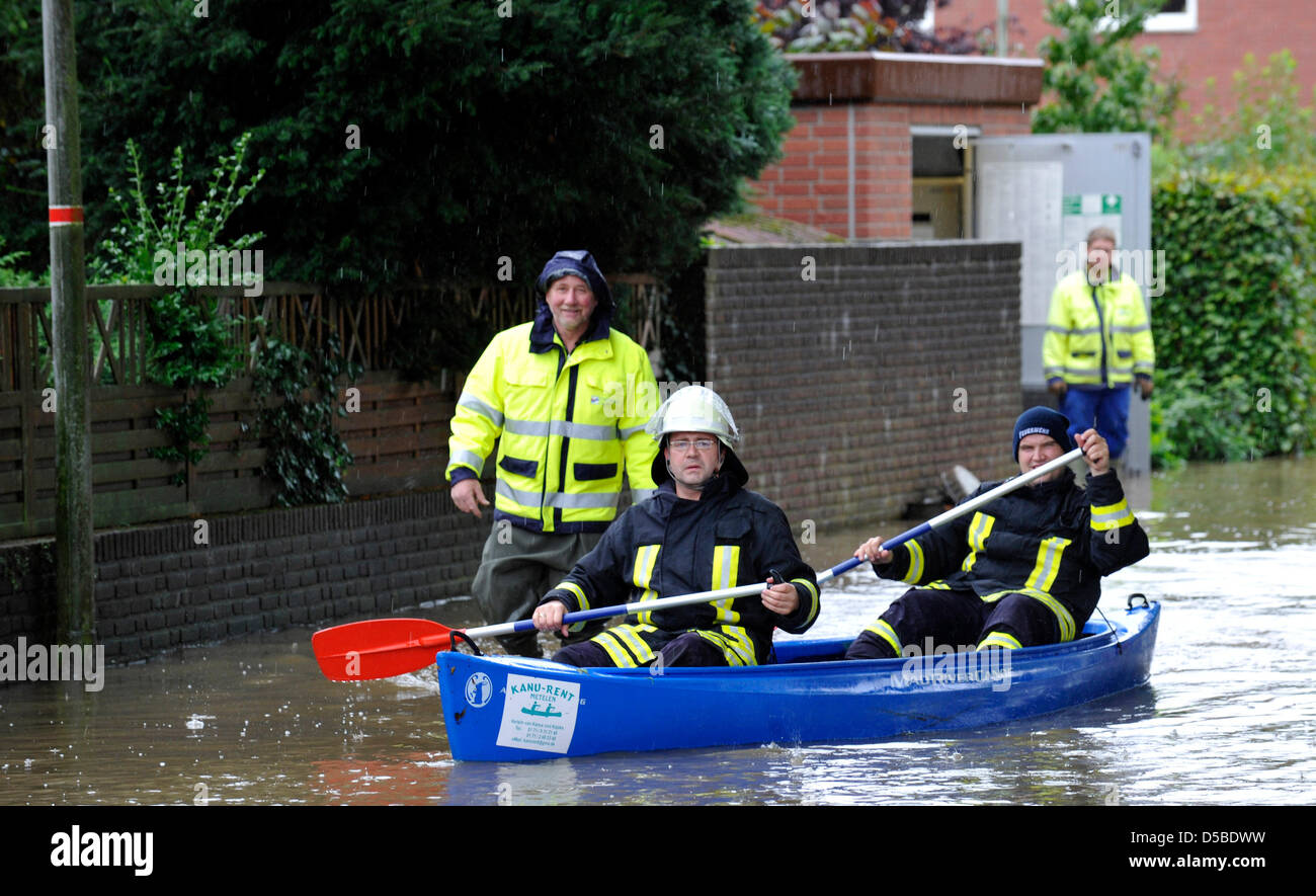 Firefighters ride a kayak during a deployment in Ochtrup-Langenhorst ...
